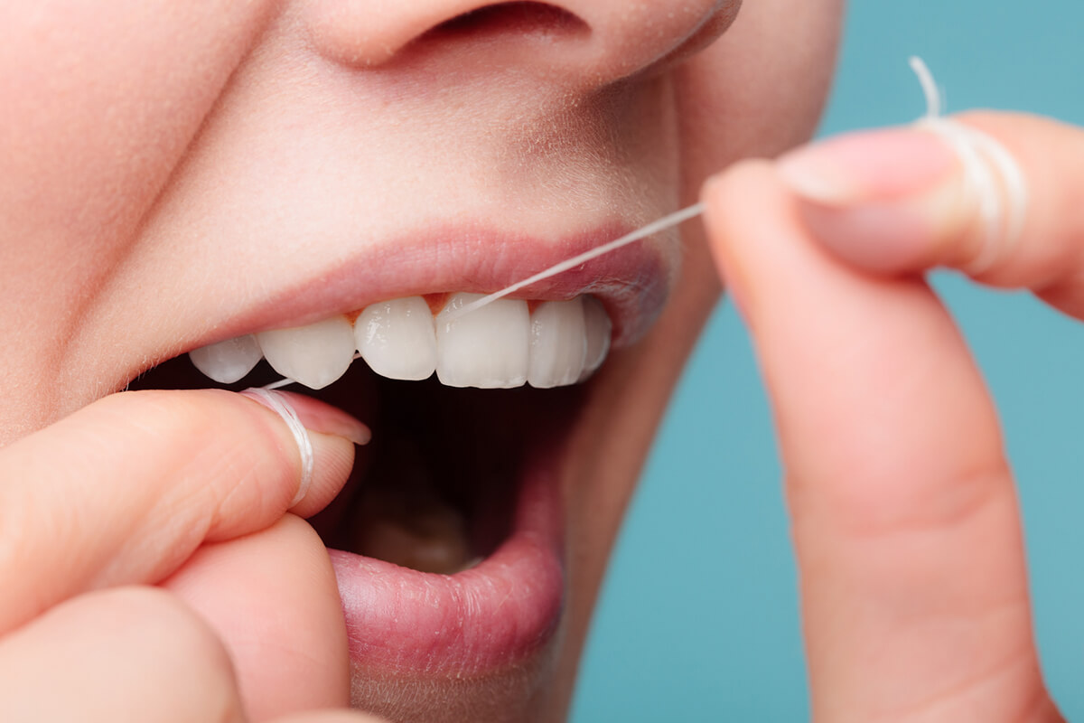A Complete Guide to Flossing Teeth - San Francisco Dental Wellness